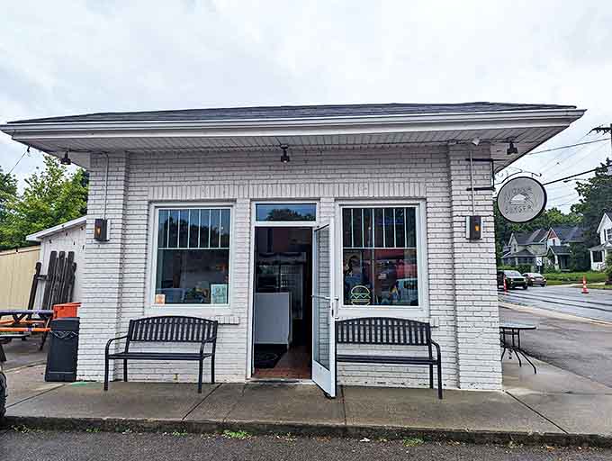 Exterior: A humble white brick building that houses flavor explosions within – Nonla Burger's unassuming exterior belies the culinary treasures waiting inside.