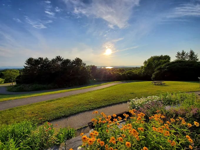 Sunset paints the sky in watercolor hues at Overlook Park, where Vermont's beauty unfolds like a love letter to nature.