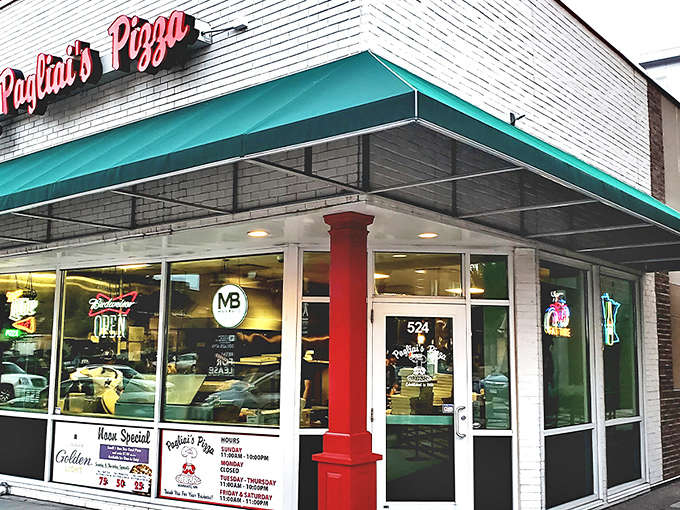 The iconic white brick facade of Pagliai's Pizza in Mankato beckons with its vintage charm and promise of pizza perfection.