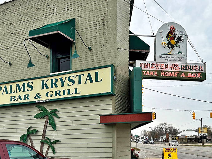 The iconic exterior of Palms Krystal Bar & Grill, where that golf-playing rooster has been promising delicious chicken since before most of us had our first solid food.
