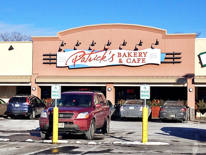 Patrick's Bakery & Caf&eacute; glows invitingly at dusk, a beacon of French culinary delight nestled in suburban Richfield.
