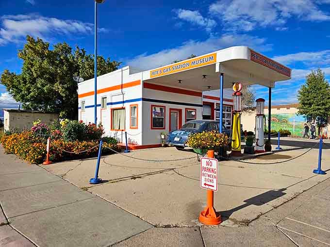 That classic gas station facade isn't a movie set, it's the real deal, complete with period-perfect pumps that once dispensed actual gasoline to actual road trippers.