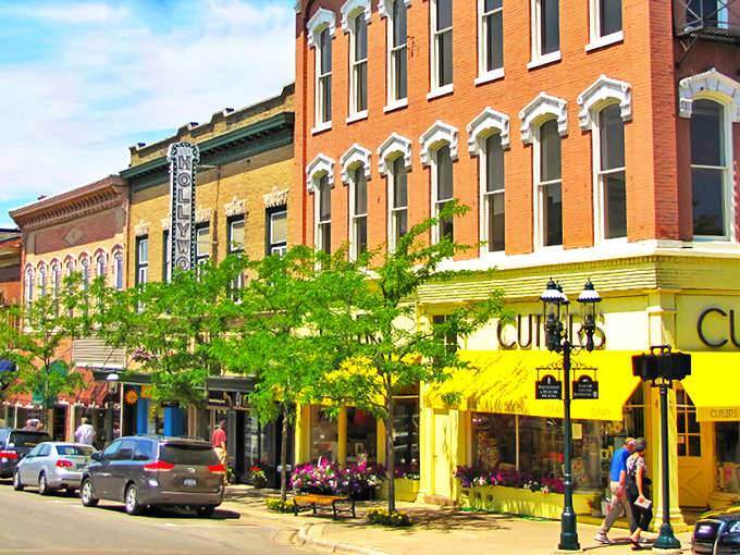 Downtown Petoskey's vibrant storefronts pop with color against historic brick buildings &ndash; a living museum where every shop tells a story.