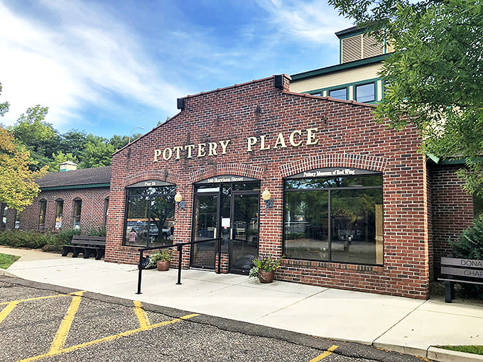The iconic brick fa&ccedil;ade of Pottery Place Antiques stands like a time portal in Red Wing, promising treasures that have outlived their original owners and trends.