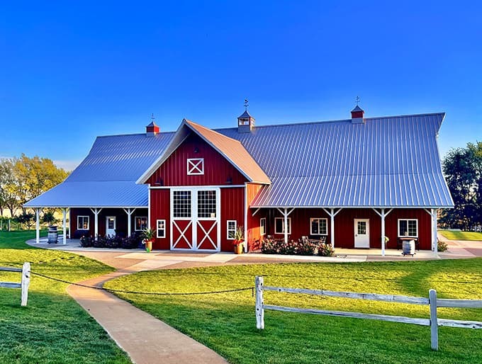 The iconic red barn stands proudly against the Minnesota sky, beckoning visitors with its classic charm and promise of wood-fired delights.