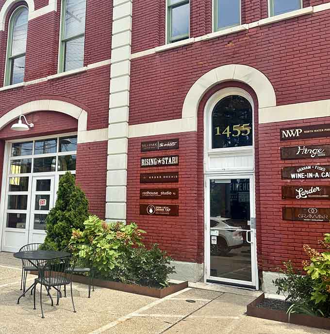 The historic red brick building stands proud on West 29th Street, its arched windows and classic architecture promising something special inside. Cleveland's hidden coffee gem awaits.