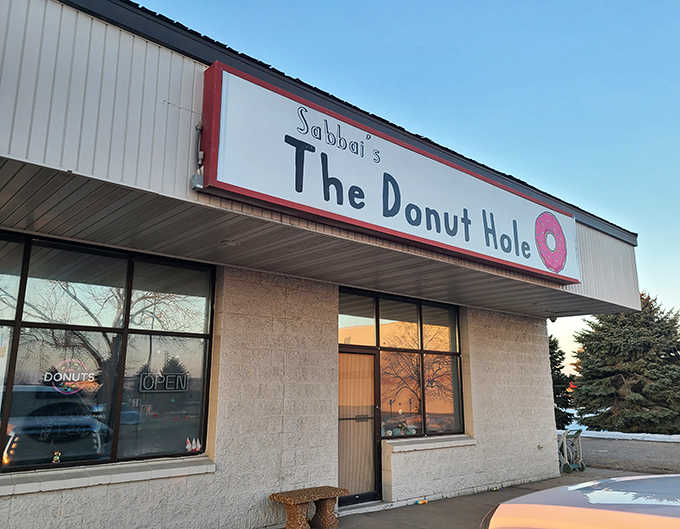 The unassuming exterior of Sabbai's The Donut Hole belies the extraordinary treats waiting inside. Simple signage, extraordinary donuts.