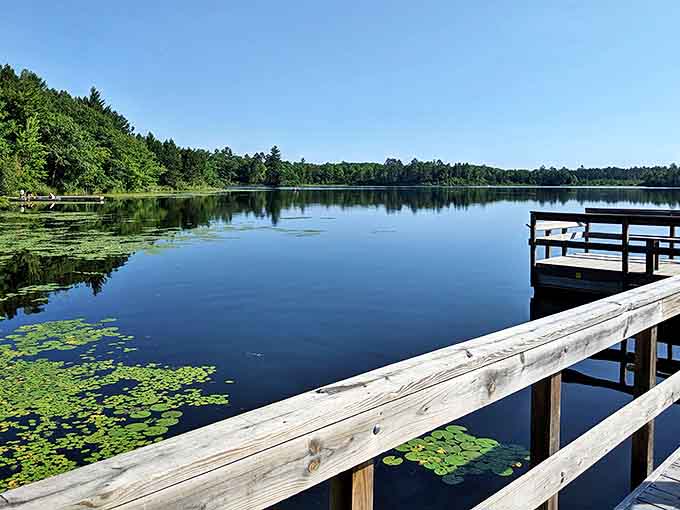 Savanna Portage's glassy waters mirror the sky like nature's own infinity pool &ndash; Minnesota serenity at its finest.