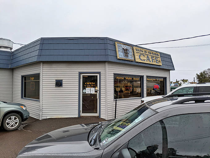 The unassuming exterior of South of the Border Cafe stands like a blue-crowned sentinel of breakfast goodness in Grand Marais.