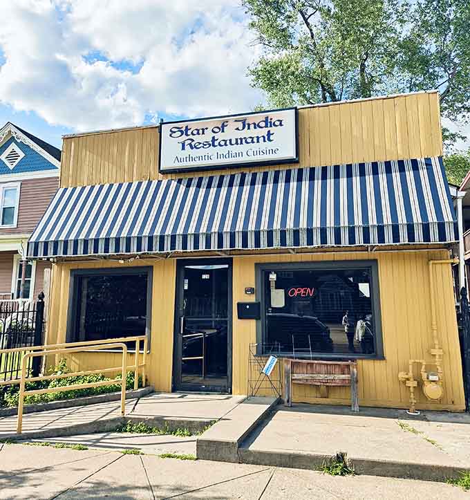 The unassuming yellow facade of Star of India belies the flavor explosion waiting inside &ndash; Athens' best-kept culinary secret stands ready to transport you.