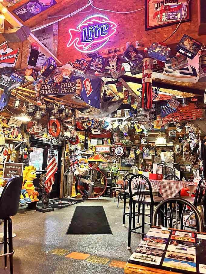 Tackle Box 2's sign promises "Camping" and "Boat Ramp," but locals know it's the incredible riverside dining that's the real attraction.