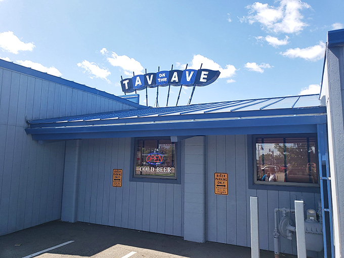 That retro blue signage isn't trying to win design awards, just beckoning you toward some seriously good eats inside.