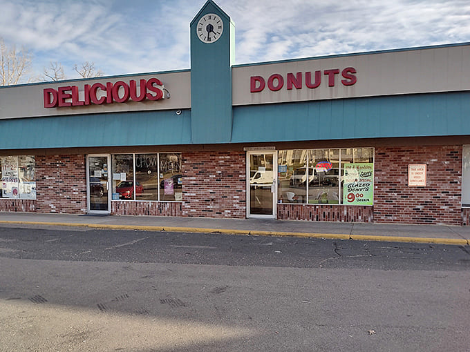 That turquoise and brick exterior might look modest, but it's hiding some of Minnesota's most magnificent donuts inside.