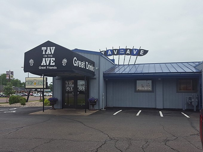 The unassuming exterior of Tav on the Ave belies the burger magic happening inside those walls.