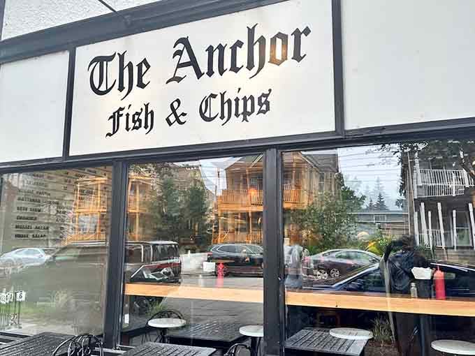 That classic storefront sign promises exactly what's inside: honest fish, perfect chips, and zero pretension.
