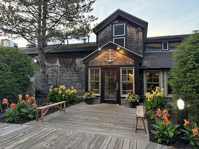 That weathered shingle exterior and welcoming entrance promise the kind of authentic Maine dining experience you've been searching for all along.