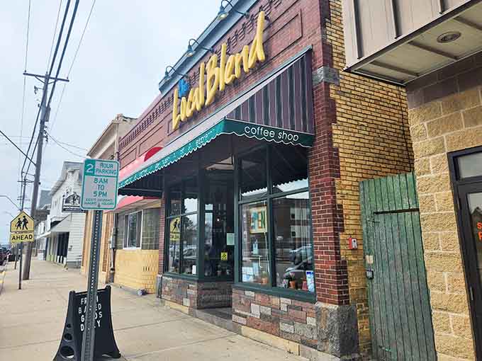 The cheerful yellow signage beckons like a beacon of caffeinated hope on Minnesota Street, promising delicious things within.