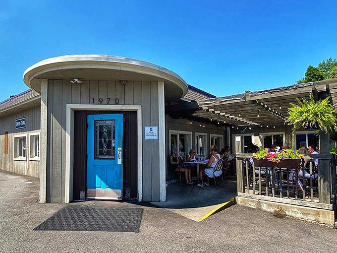 The iconic bright blue door welcomes hungry visitors to this Cuyahoga Falls culinary gem, where breakfast dreams come true daily.