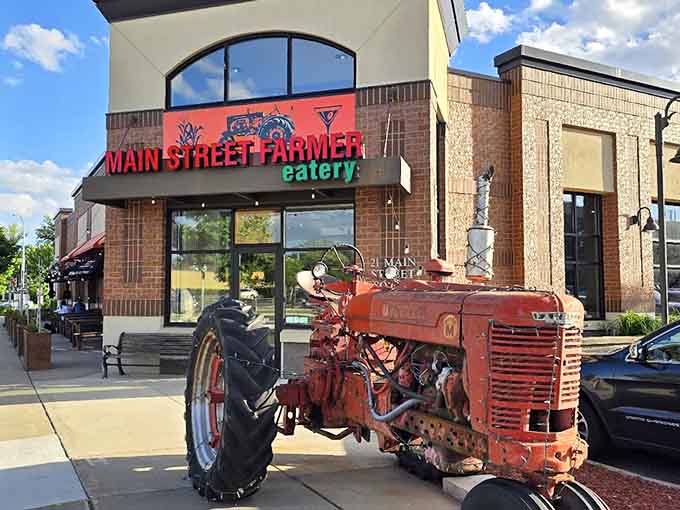 That vintage tractor isn't just lawn art, it's a delicious promise about the farm-fresh philosophy waiting inside this St. Michael gem.