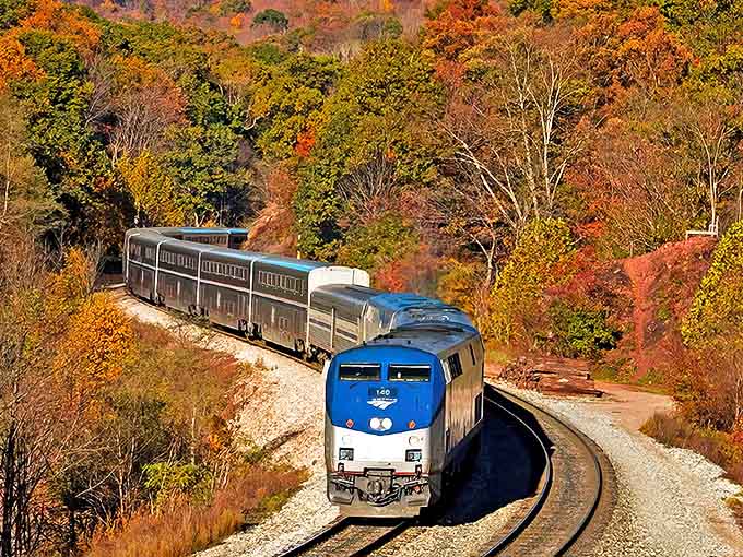 The California Zephyr snaking through fall foliage looks like a postcard that came to life and decided to show off.