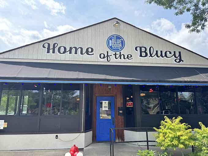 That bright blue door isn't just for show, it's your gateway to some of Minneapolis's most craveable comfort food.