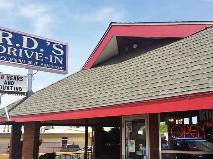 That classic red roof and vintage signage signal you've arrived at burger paradise, where decades of delicious tradition await your hungry self.