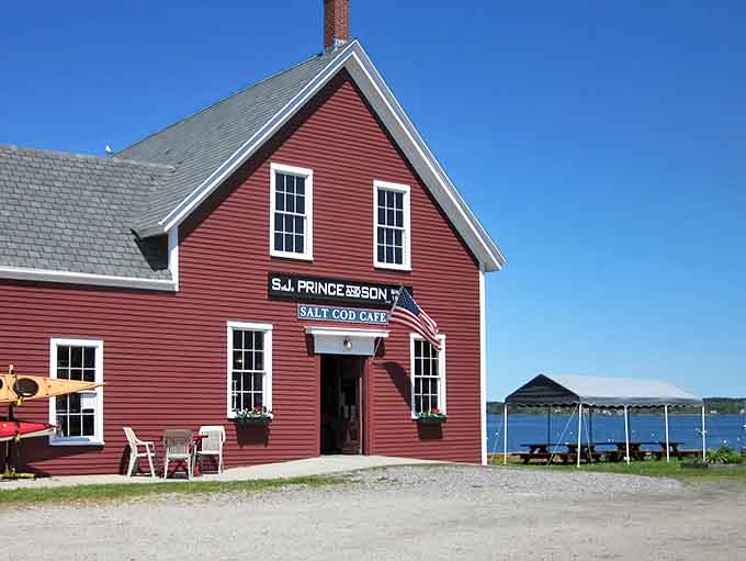 That red building against the blue sky isn't just picturesque, it's your destination for some of Maine's most talked-about scones.