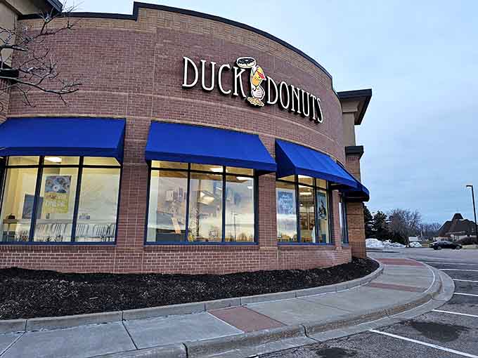 That cheerful duck mascot knows exactly what treasures await inside this Woodbury sweet spot.