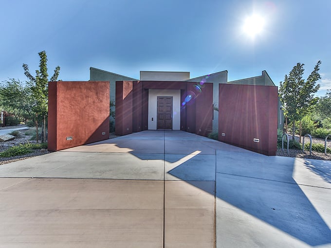The Mini Time Machine Museum's distinctive terracotta exterior stands like a modern art installation against the Tucson sky, promising wonders within its angular walls.