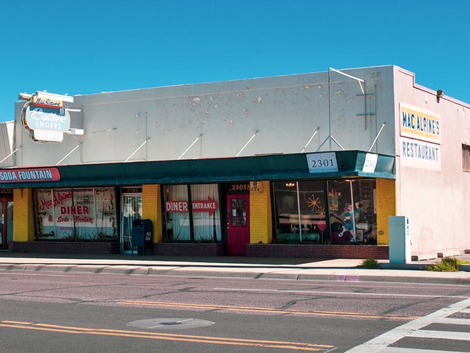 That weathered exterior isn't trying to look vintage, it simply is, standing proud on a Phoenix corner like a beacon for anyone seeking authentic diner magic.