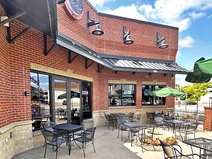 The welcoming brick exterior of Pub 500 beckons hungry diners like a lighthouse guides ships to shore.