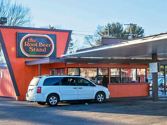 The iconic bright orange exterior of The Root Beer Stand stands as a beacon of nostalgia in Kalamazoo, promising simple pleasures and timeless flavors.