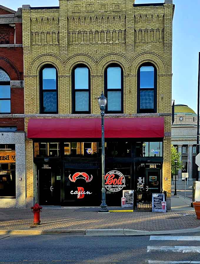 That classic yellow brick facade is your first clue that something special awaits inside this downtown St. Cloud gem.