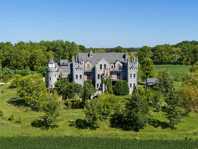 Ravenstone Castle emerges from the Illinois countryside like a medieval mirage, its stone turrets defying the flat Midwestern landscape.