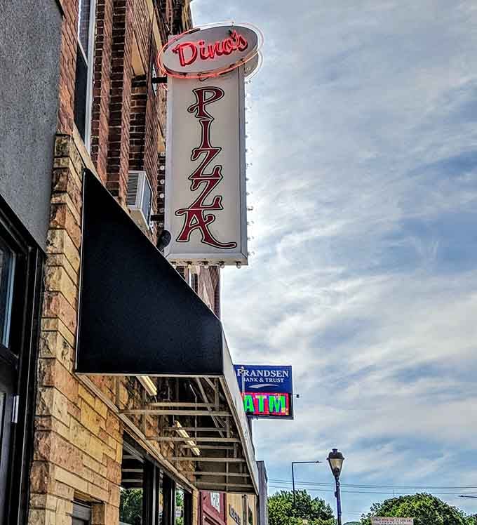 That vintage sign beckons like a beacon of hope for hungry souls seeking pizza perfection in North Mankato.