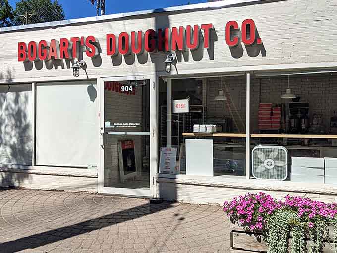 That red lettering against white brick is basically a beacon calling all donut lovers to their happy place.