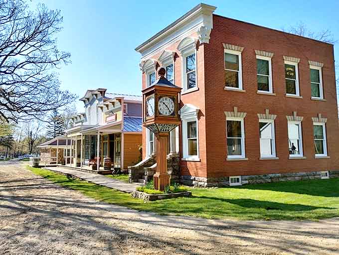 The stately Hastings City Bank stands as the village sentinel, its brick façade and clock tower whispering tales of commerce from another century.