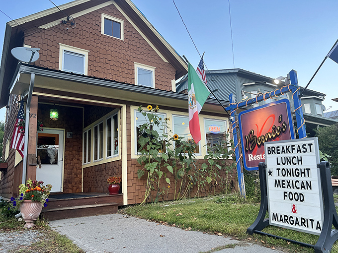Bernie's welcoming exterior beckons with its homey brick facade and colorful sign &ndash; a Vermont breakfast promise waiting to be kept.