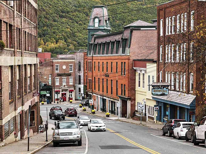 Downtown Brattleboro welcomes visitors with its colorful brick buildings nestled against Vermont's lush green mountains &ndash; small-town charm with big personality.