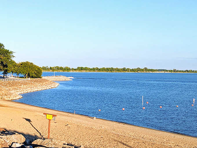Keyesport Beach stretches out like nature's welcome mat, where the blue waters of Carlyle Lake invite visitors to forget they're in Illinois.