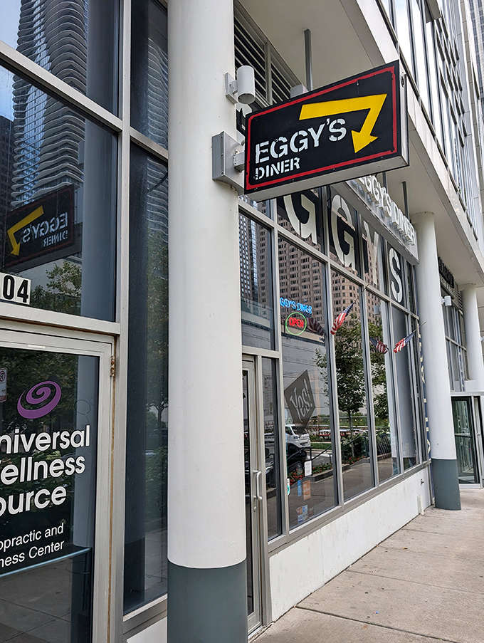 That bold yellow and black sign beckons like a breakfast beacon, promising the kind of morning meal that makes getting out of bed worthwhile.