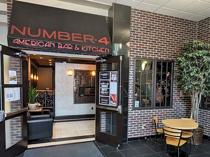 That glowing neon sign beckons like a beacon of beefy hope, promising carnivorous delights just beyond those doors.