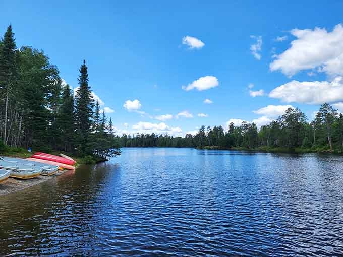 Bear Head Lake stretches out like nature's own mirror, reflecting clouds and pines in water so clear you'll wonder if it's real or just really good CGI.
