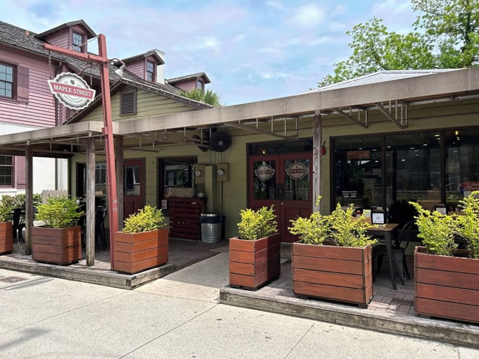 The welcoming facade of Maple Street Biscuit Company beckons hungry travelers with its understated charm and promise of carb-laden delights within.
