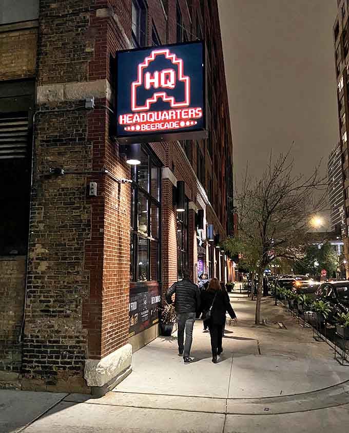 That glowing sign isn't just marking a location, it's a beacon calling all who remember when quarters were currency and high scores were everything.