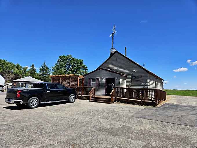 The unassuming exterior hides one of Minnesota's best-kept culinary secrets, proving you can't judge a steakhouse by its siding.