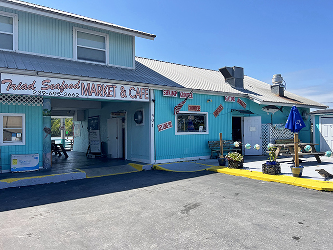 The cheerful turquoise exterior of Triad Seafood beckons like a siren call to hungry travelers. Florida doesn't get more authentic than this.