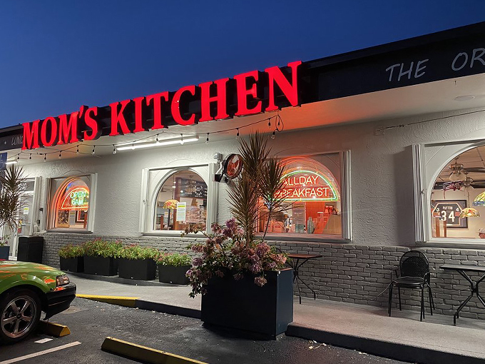 Mom's Kitchen glows like a breakfast beacon on Federal Highway, its red neon sign promising morning magic to all who enter.