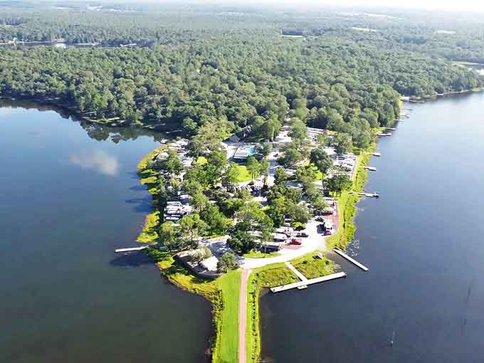 A peninsula paradise where two lakes embrace a haven of tranquility, offering waterfront views that soothe the soul instantly.