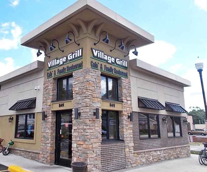 The stone-faced exterior of Village Grill Caf&eacute; & Family Restaurant stands as Royal Oak's unassuming temple to breakfast perfection.